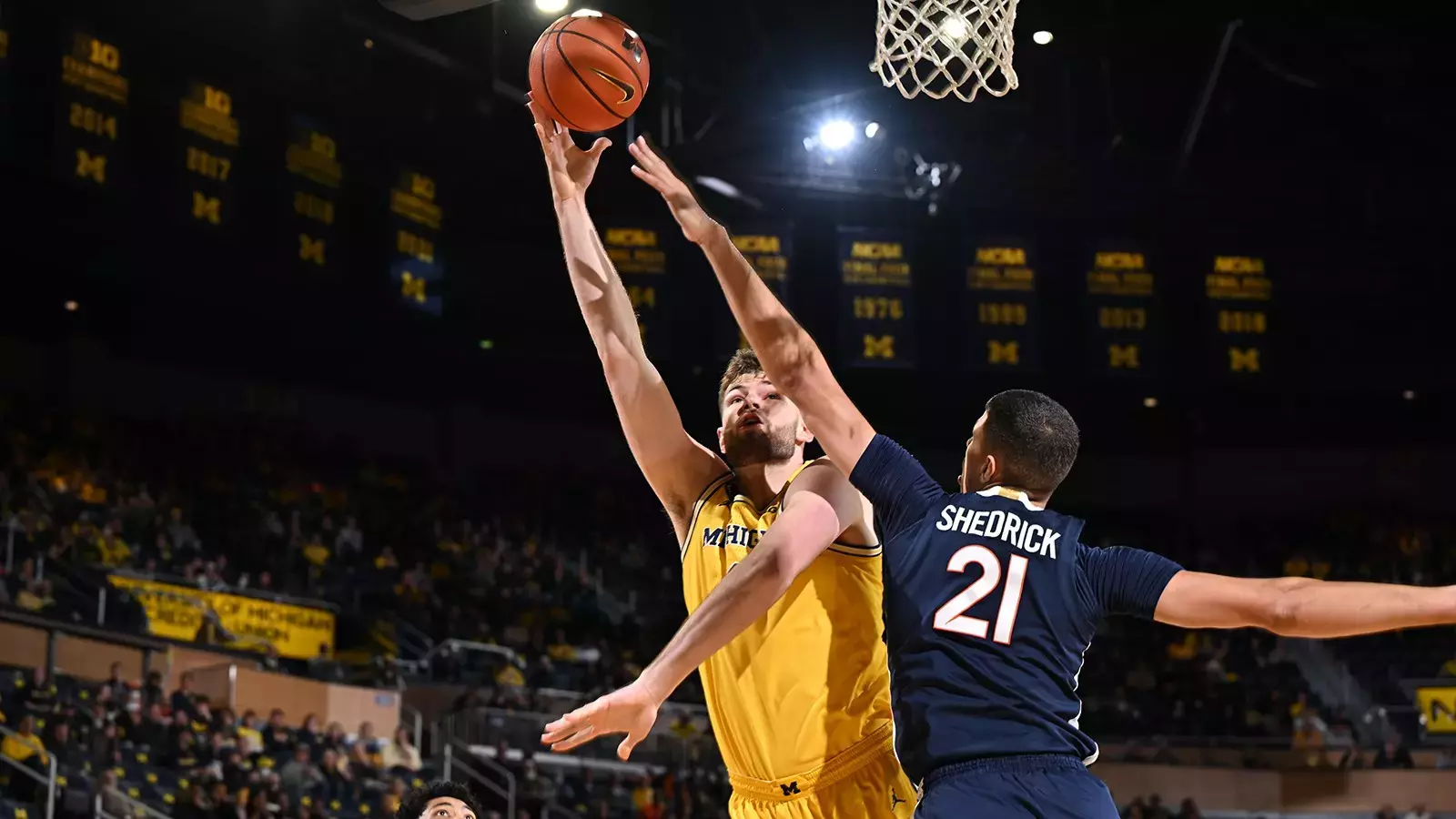 Upset Bid Comes up Short as Michigan Falls to Third-Ranked Virginia, 70 ...